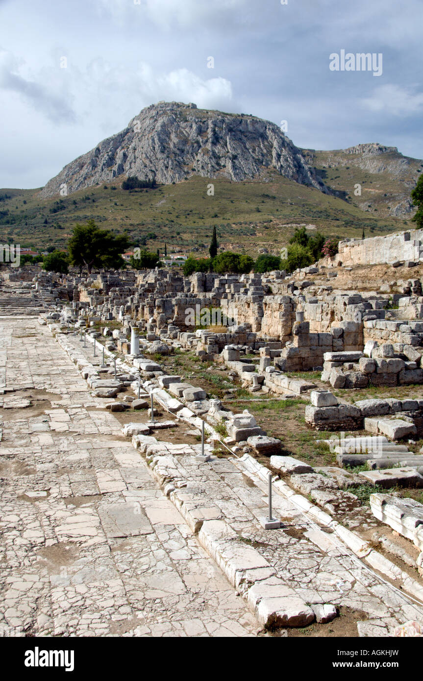 Ruins of the ancient city of Corinth with the Acropolis of Acrocorinth ...