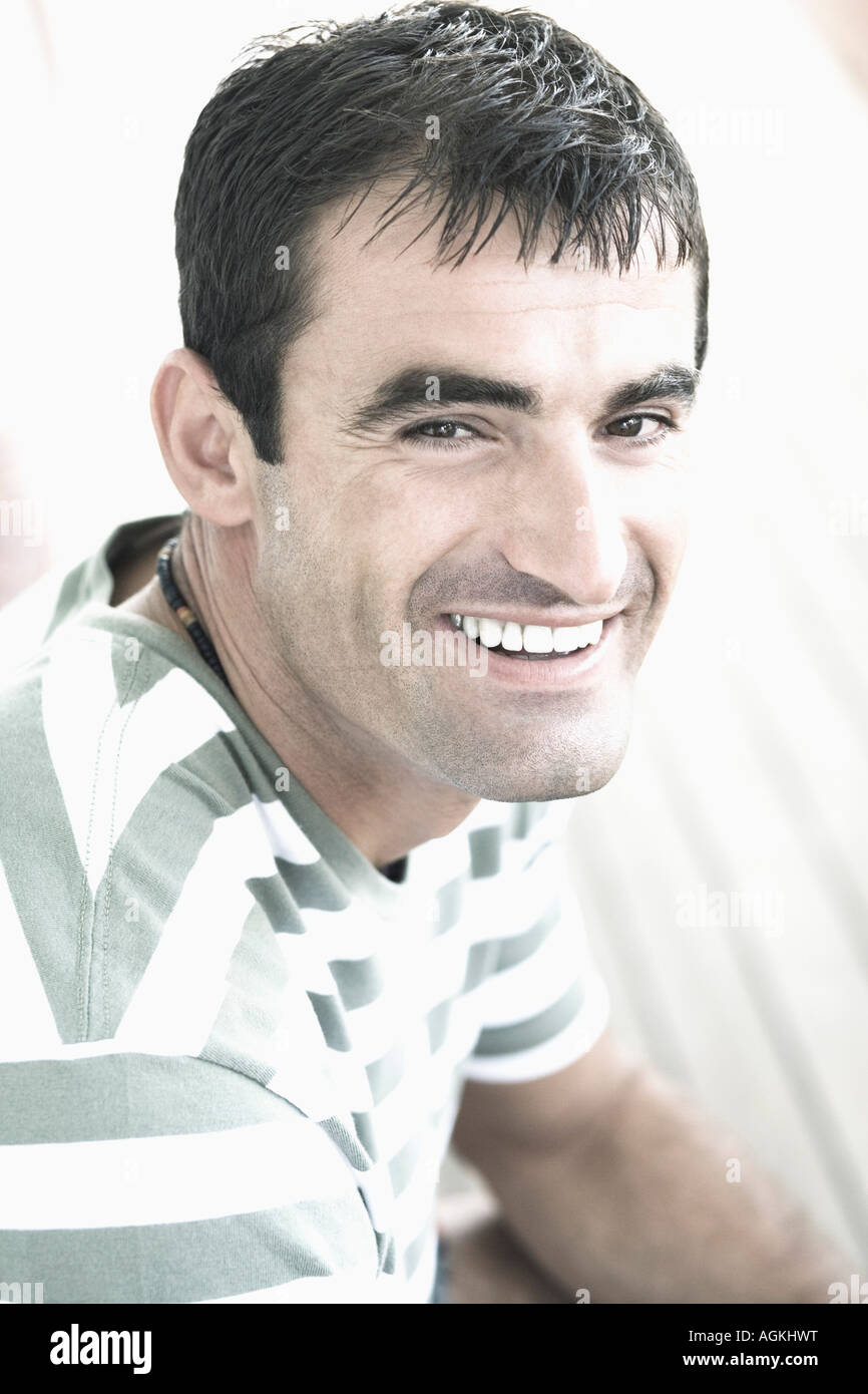 Portrait of a mid adult man smiling Stock Photo - Alamy