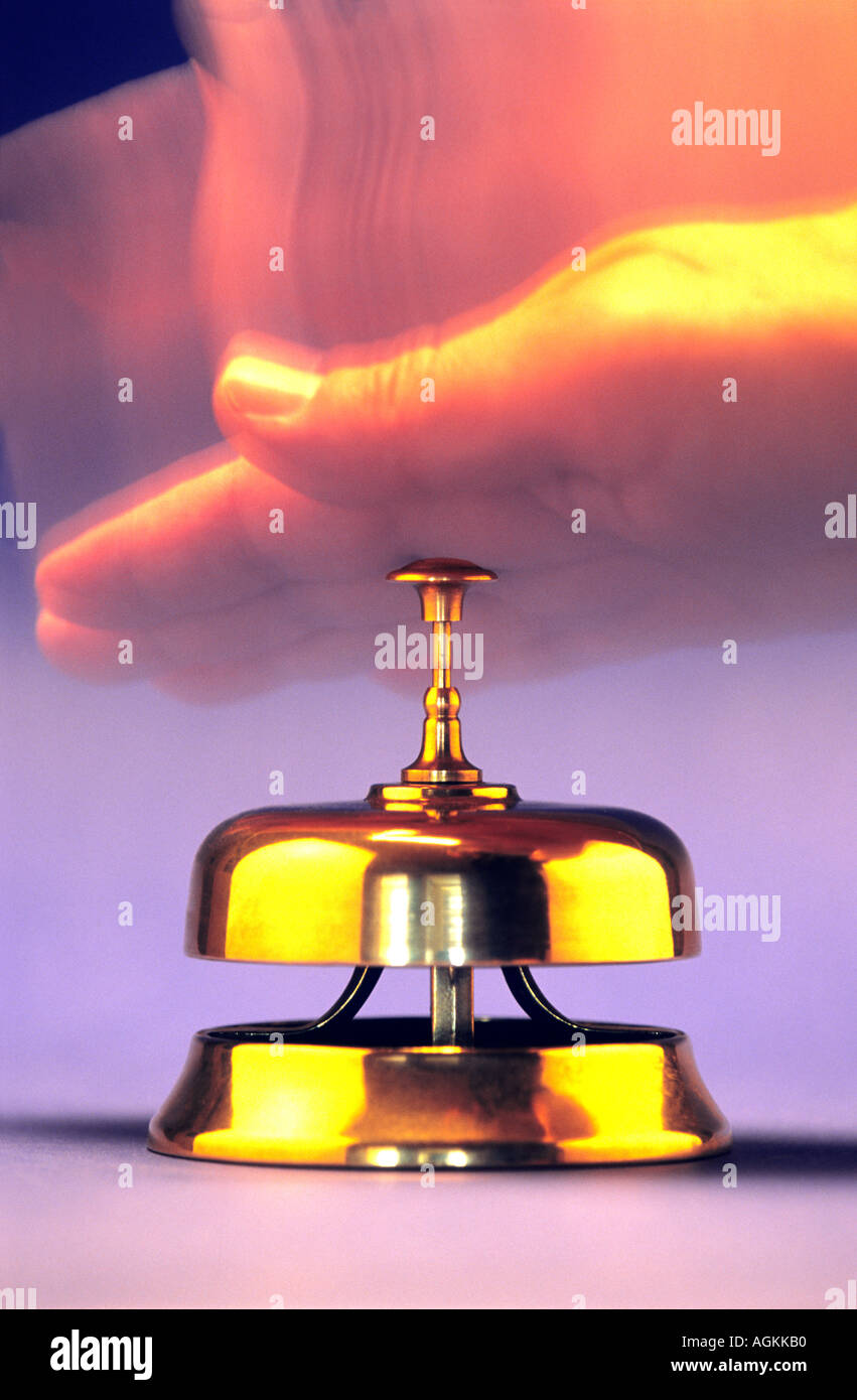 MAN S HAND HITTING A SERVICE BELL Stock Photo - Alamy