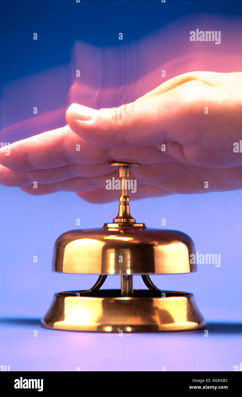 MAN S HAND HITTING A SERVICE BELL Stock Photo - Alamy
