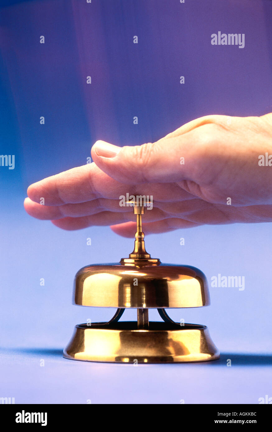 MAN S HAND HITTING A SERVICE BELL Stock Photo - Alamy