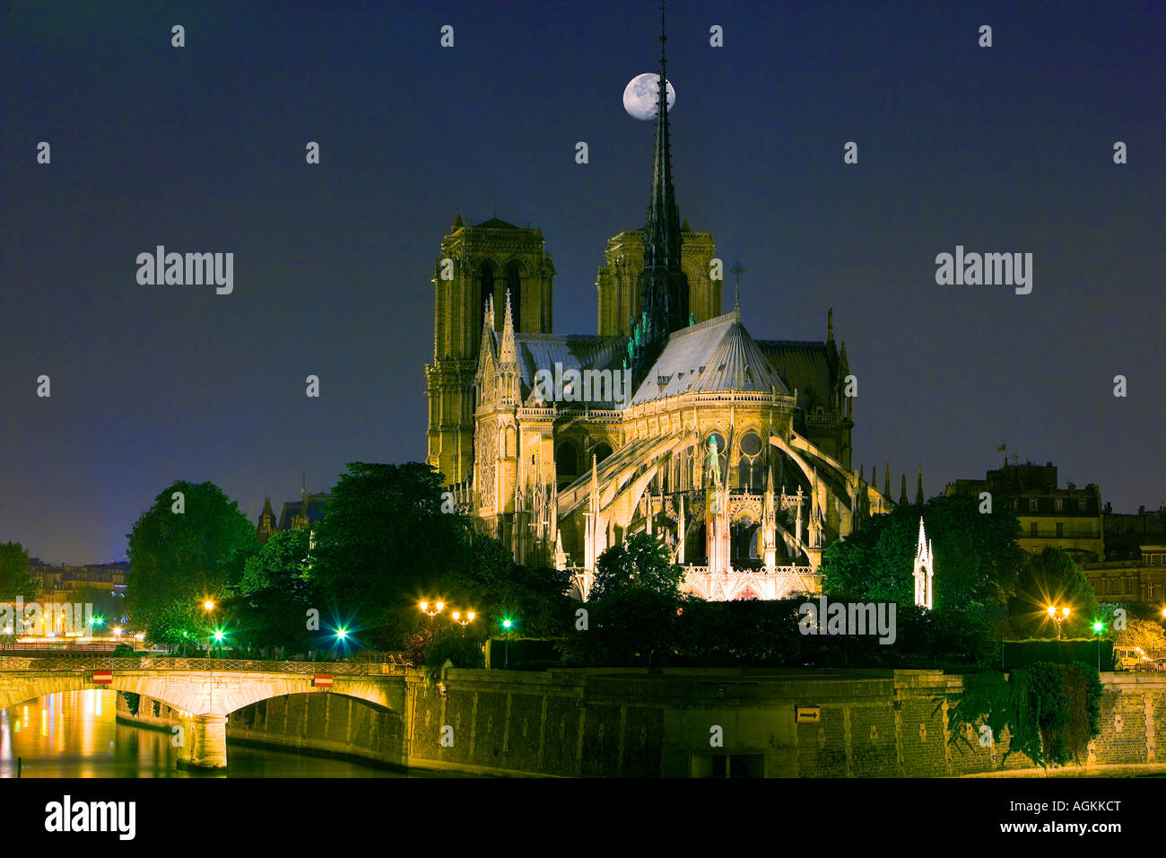 France, Paris. Full moon over Notre Dame Cathedral at night Stock Photo ...