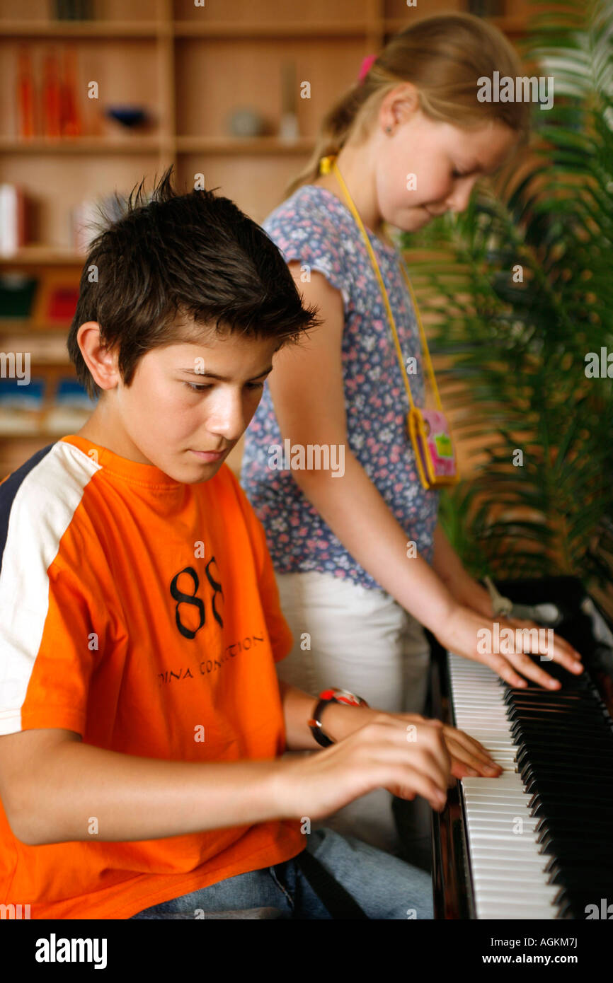 two young kids making music together Stock Photo - Alamy