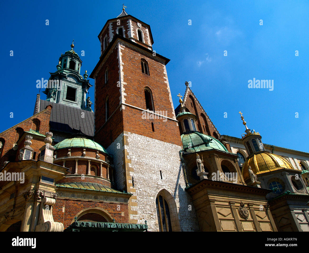 Turrets, gilded domes, towers, and archways of the Cathedral of Wawel ...