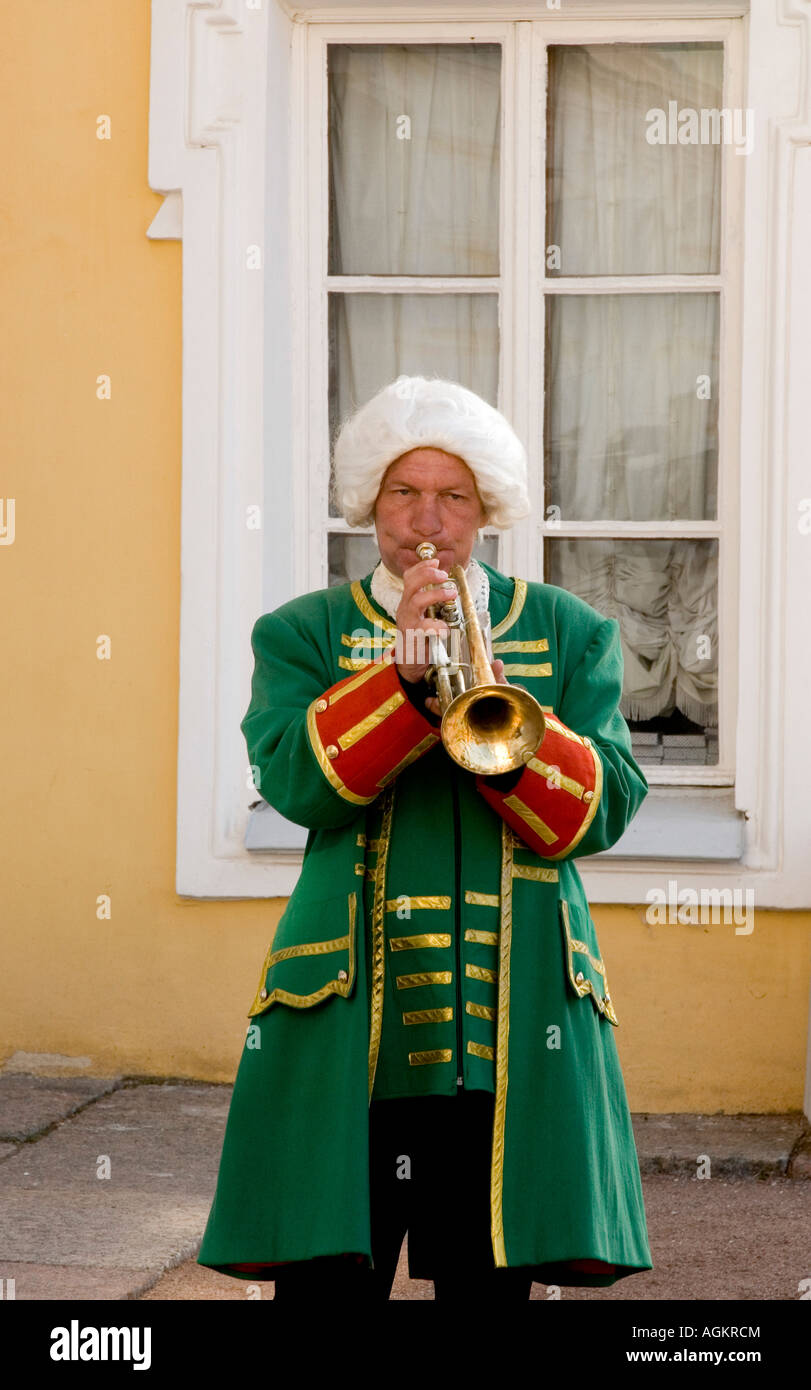 Russia, St Petersburg. A musician welcomes visitors upon their arrival ...