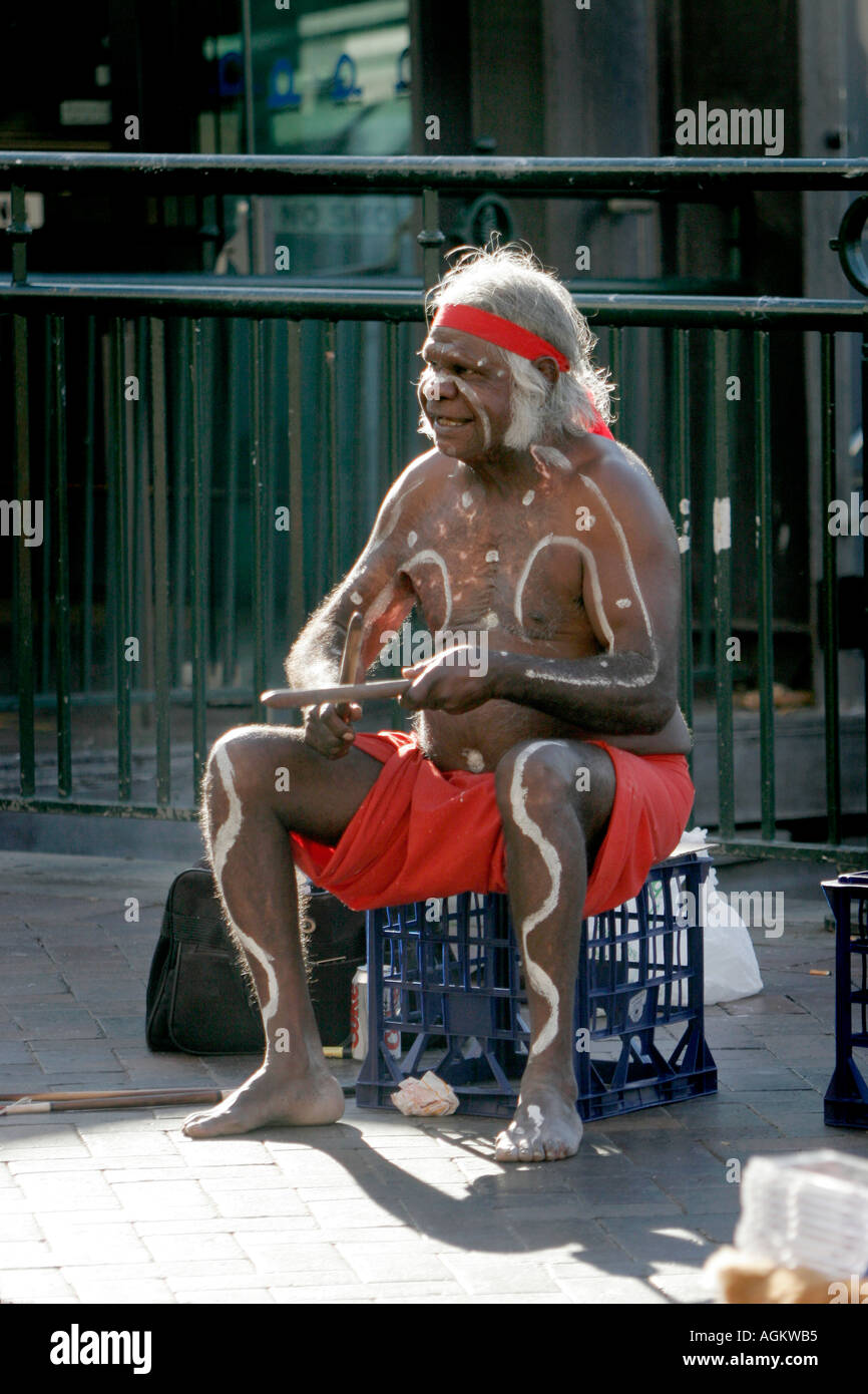 An Australian aboriginal busker with music sticks in Circular quay ...