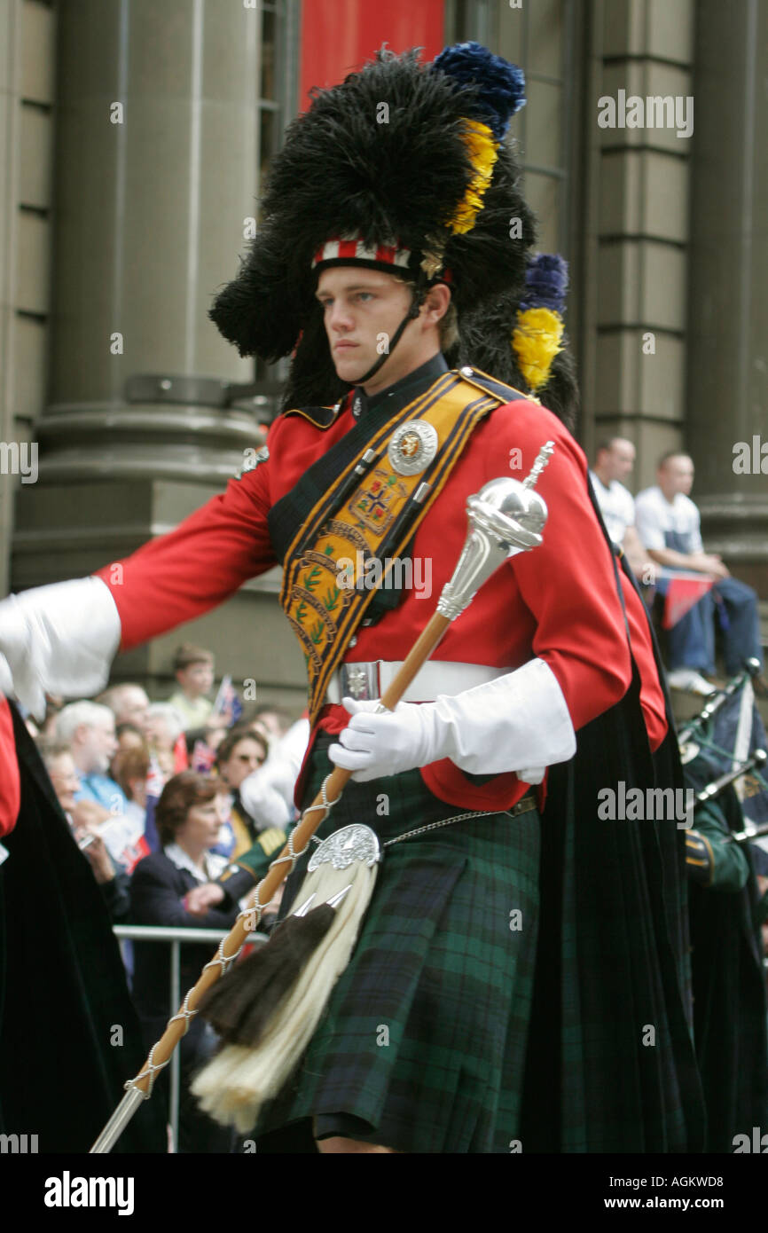 A member of a Scottish highland pipe band marches in the annual ANZAC ...