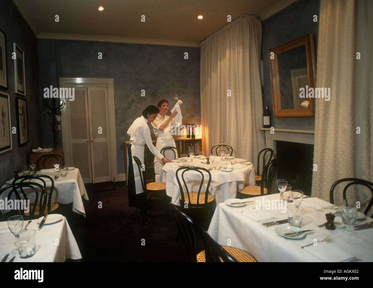 Waiting staff polishing the glassware in a restaurant Stock Photo - Alamy