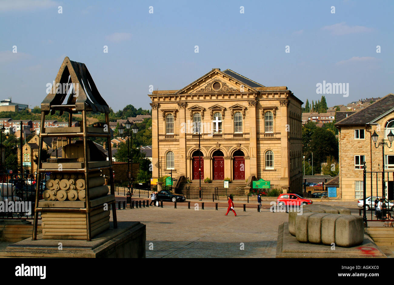 The Market Place with a sculpture in the foreground and The Central ...