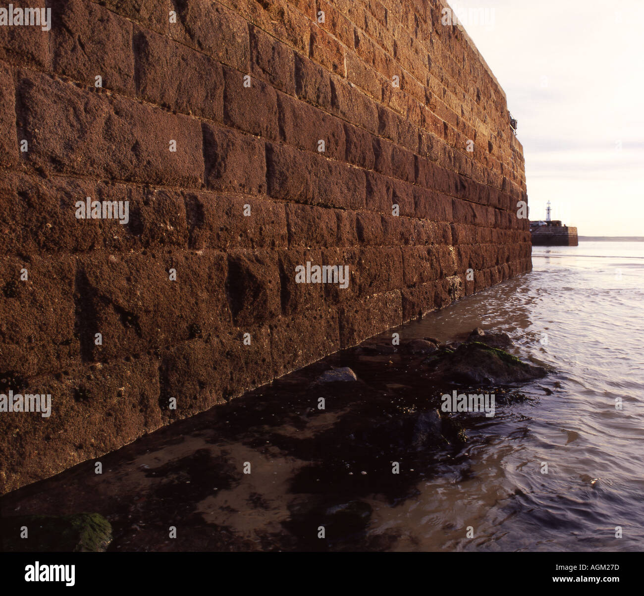 granite pier with lighthouse in distance in 7x6 number 2081 Stock Photo ...