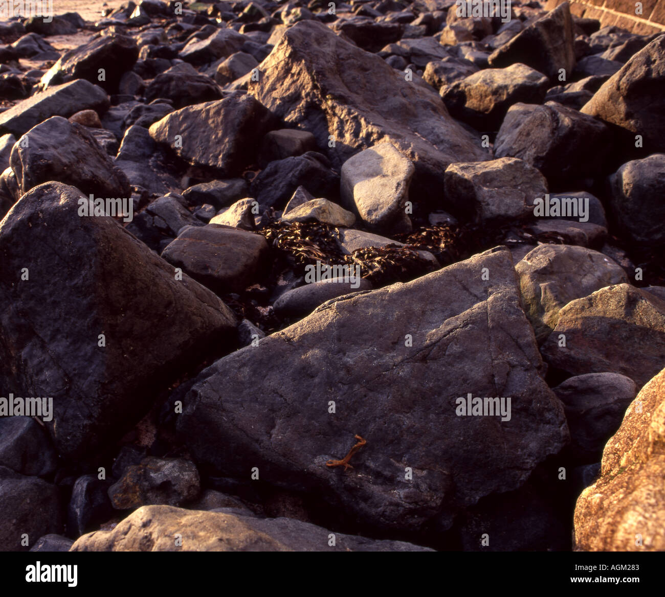 wet rocks in light and shade in 7x6 number 2082 Stock Photo - Alamy