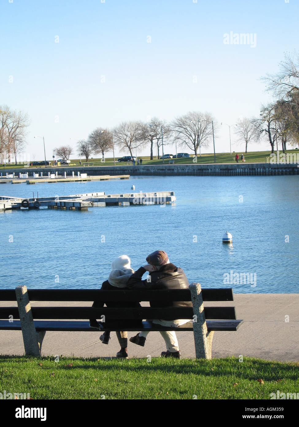 Old park bench by a pond hi-res stock photography and images - Alamy