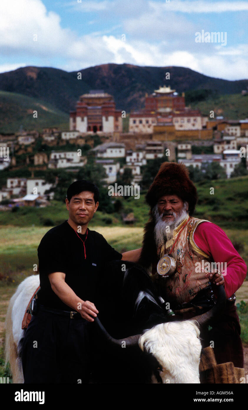 Chinese tourist poses for picture with Tibetan herdsman Zhongdian ...