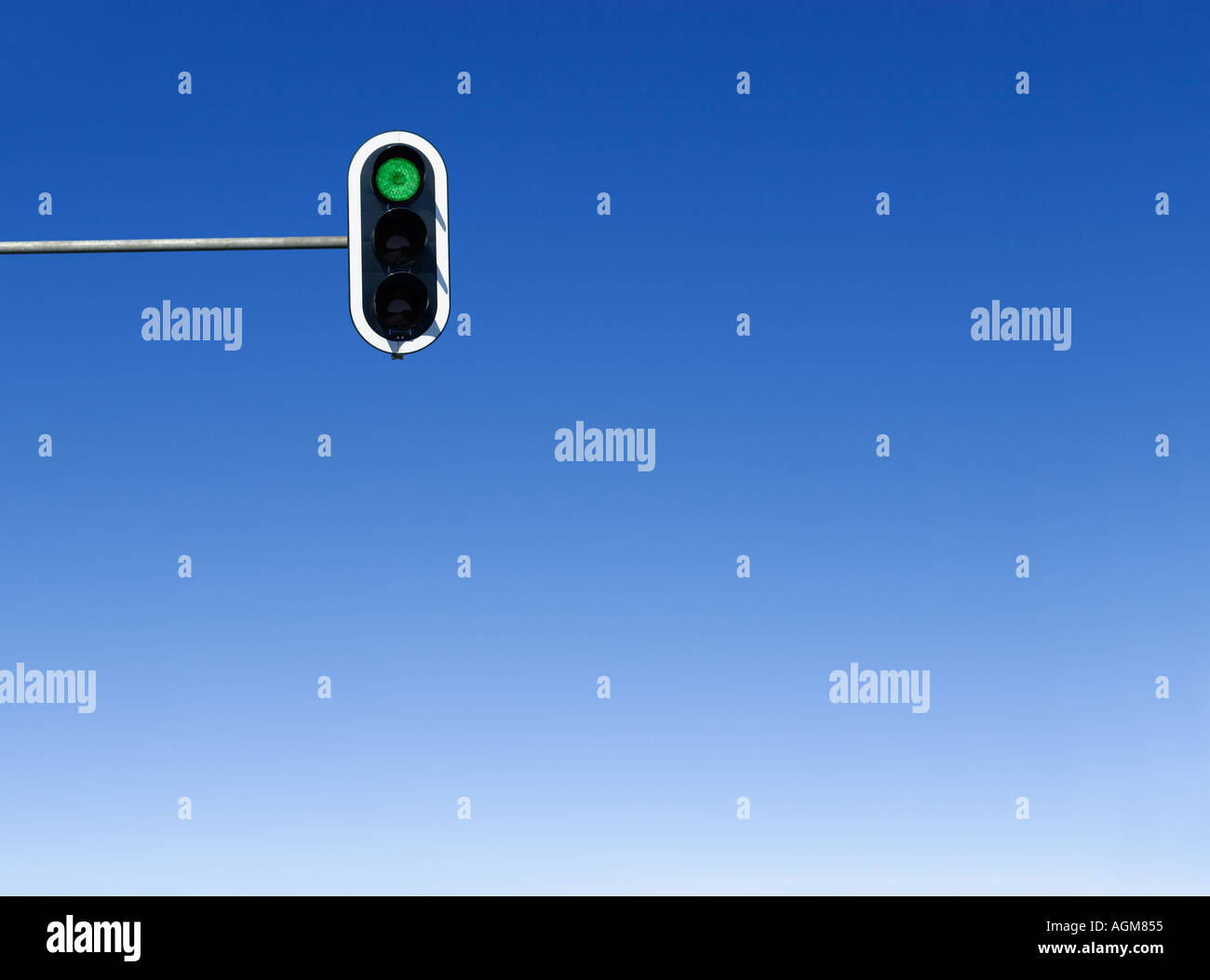 traffic light in blue sky Stock Photo - Alamy
