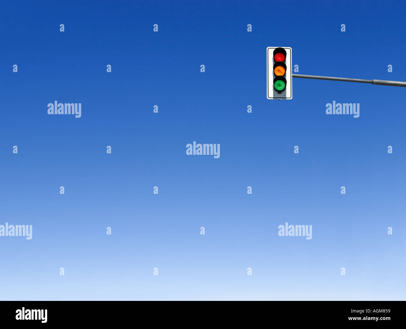 traffic light in blue sky Stock Photo - Alamy