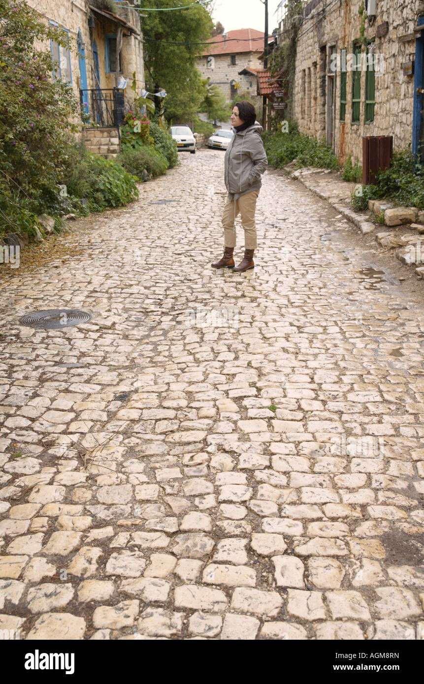 Israel upper Galilee Rosh Pinna a female tourist in the renovated old ...