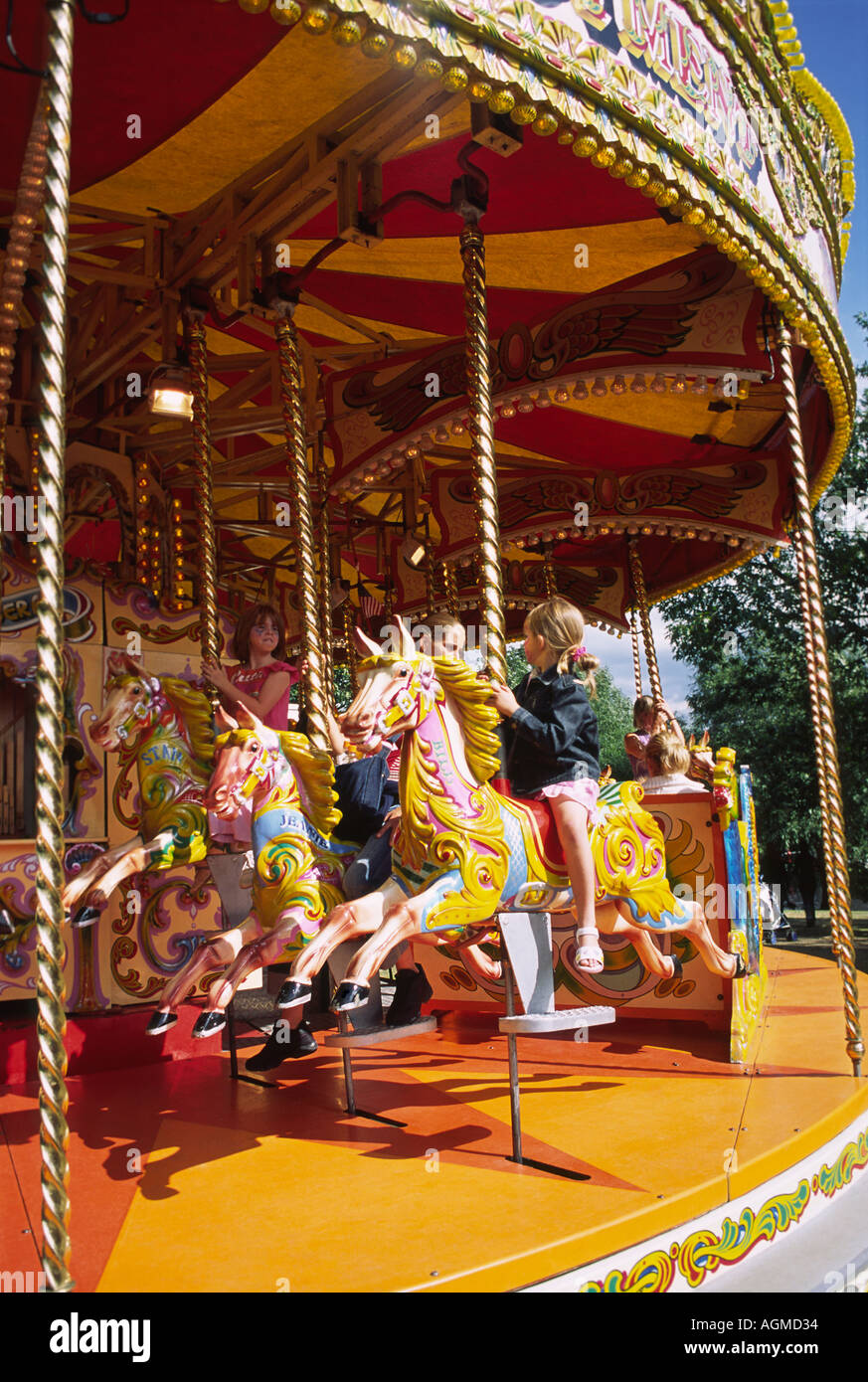 Children fairground carousel horses hi-res stock photography and images ...