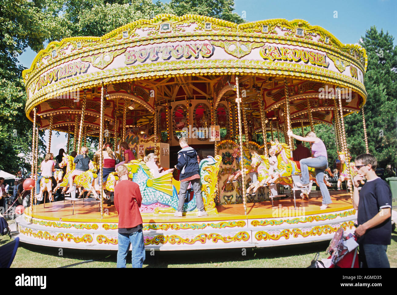 Children fairground carousel horses hi-res stock photography and images ...