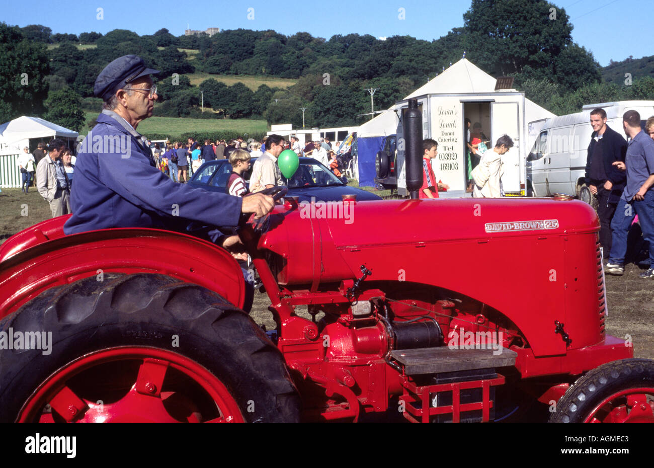 Farmer driving a David Brown 25 tractor at the Chagford show on the ...