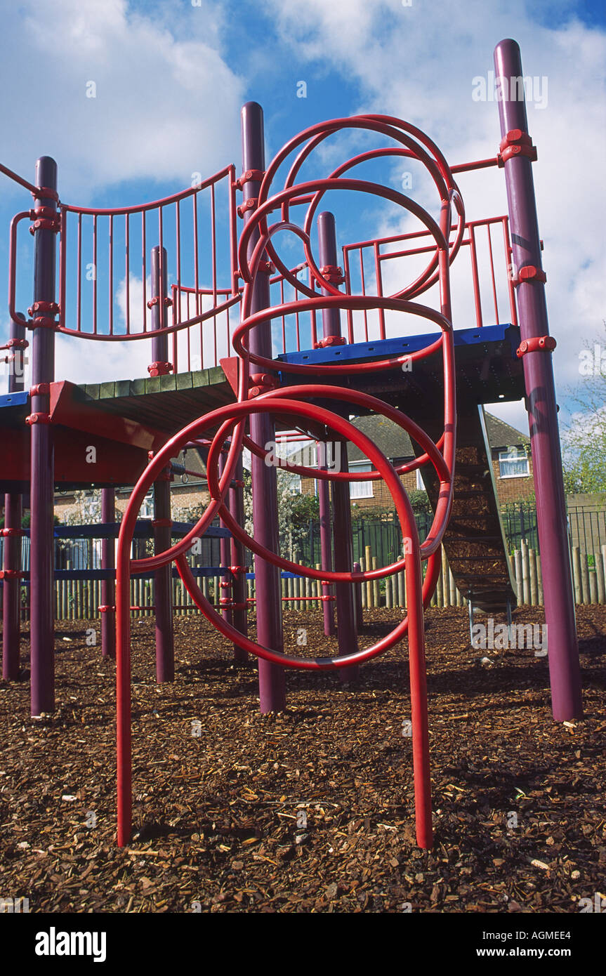 Red climbing frame in Playground Vertical Format Stock Photo - Alamy
