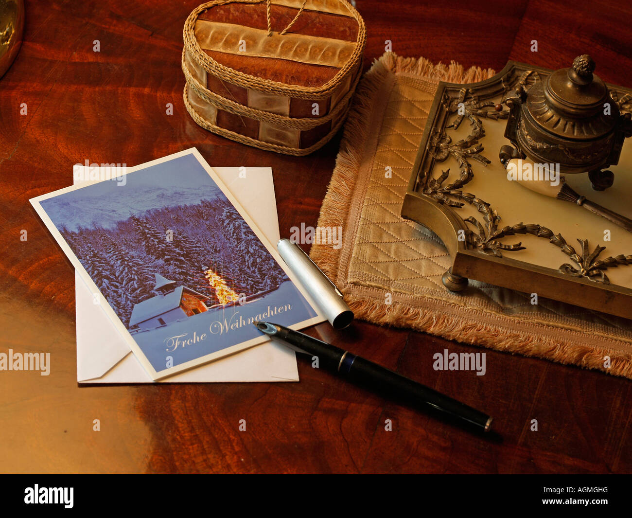 writing a Christmas greetings cards fountain pen on a Christmas card on ...