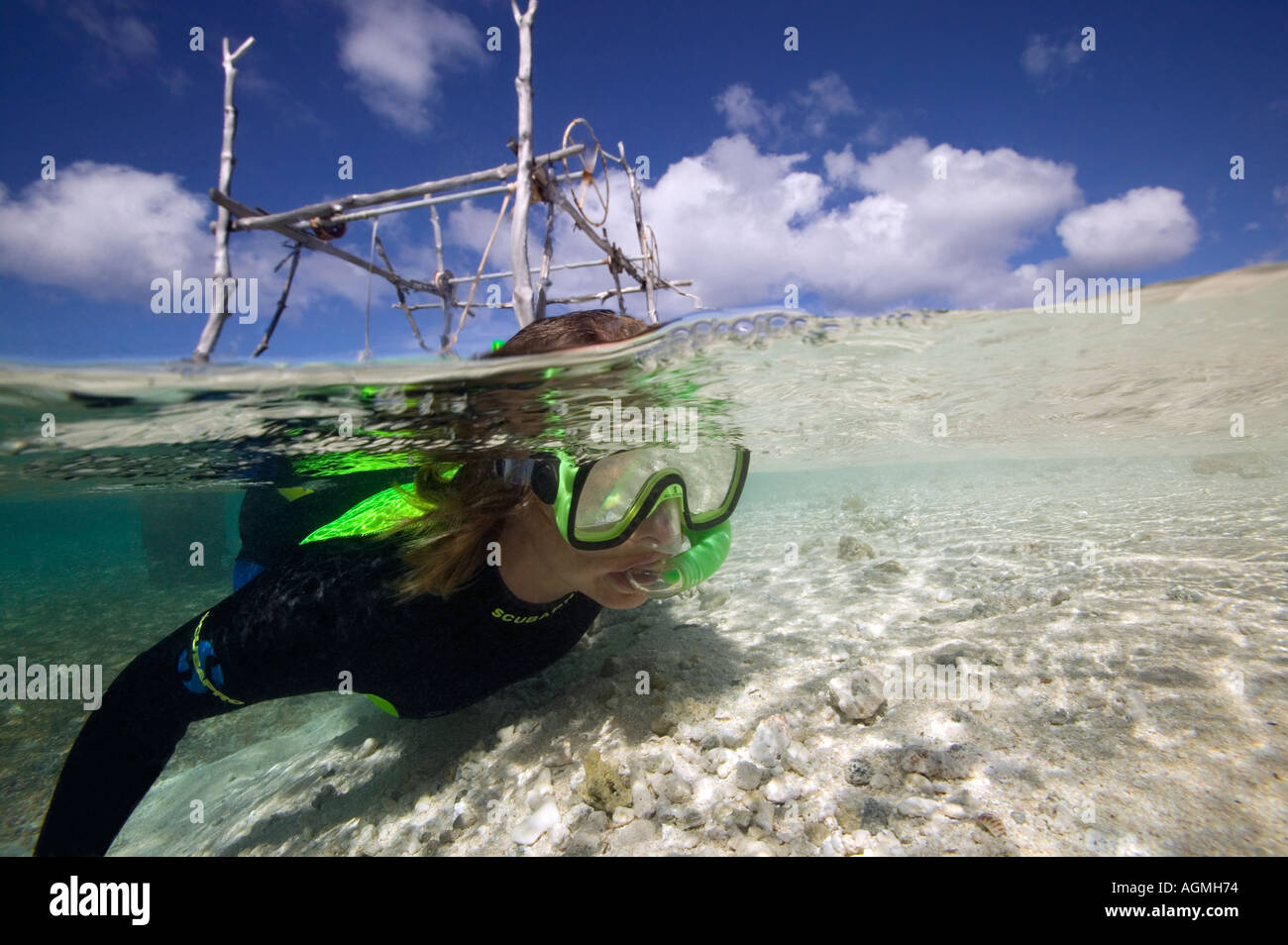 Under over views in shallow water at Toau Atoll French Polynesia Stock ...