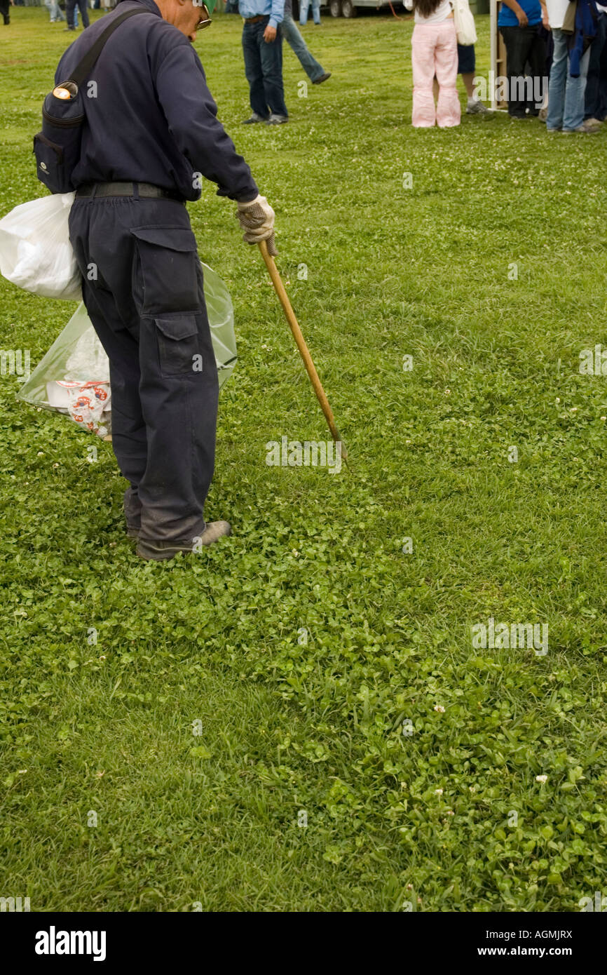 Picking up litter with stick hi-res stock photography and images - Alamy