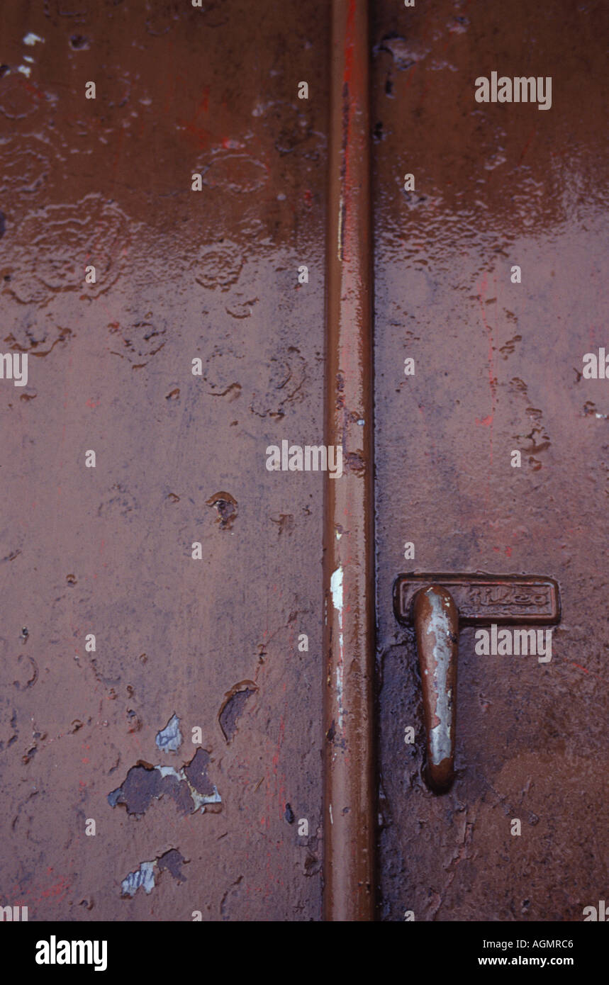An old steel door in the rain Stock Photo - Alamy