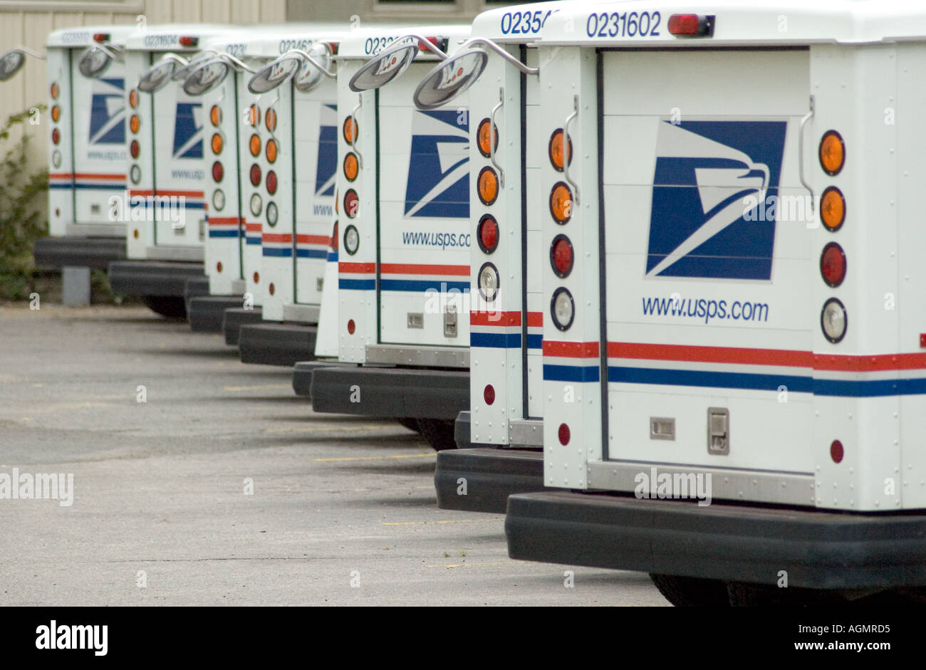 A zoom shot featuring US Postal Service delivery vehicles Stock Photo ...
