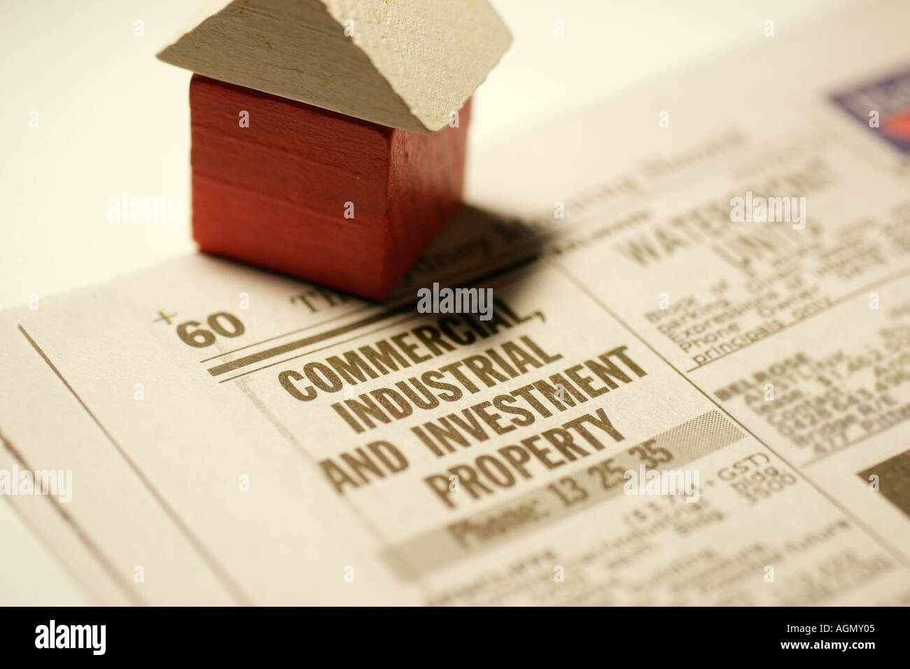 Miniature House on Real Estate Ads Stock Photo - Alamy
