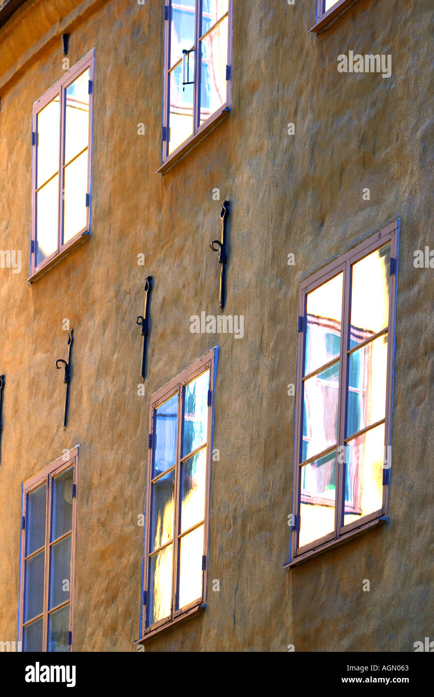 Windows reflecting the strong autumnal light in Gamla Stan Stockholms ...