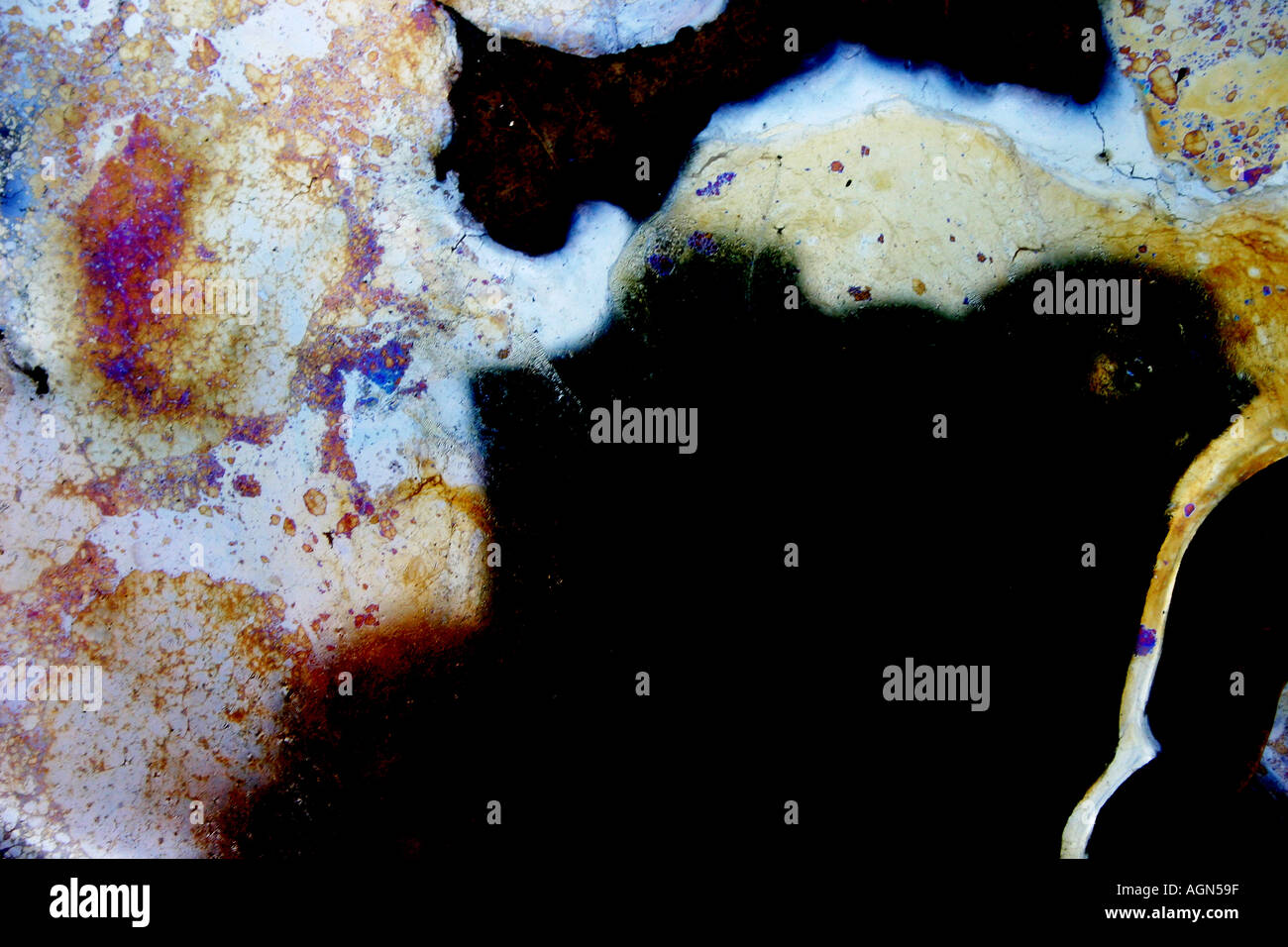 frozen oil contaminated water Stock Photo - Alamy