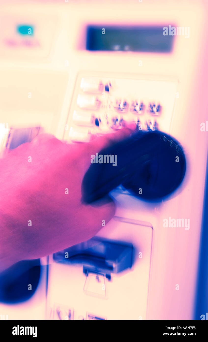 Female using payphone hi-res stock photography and images - Alamy