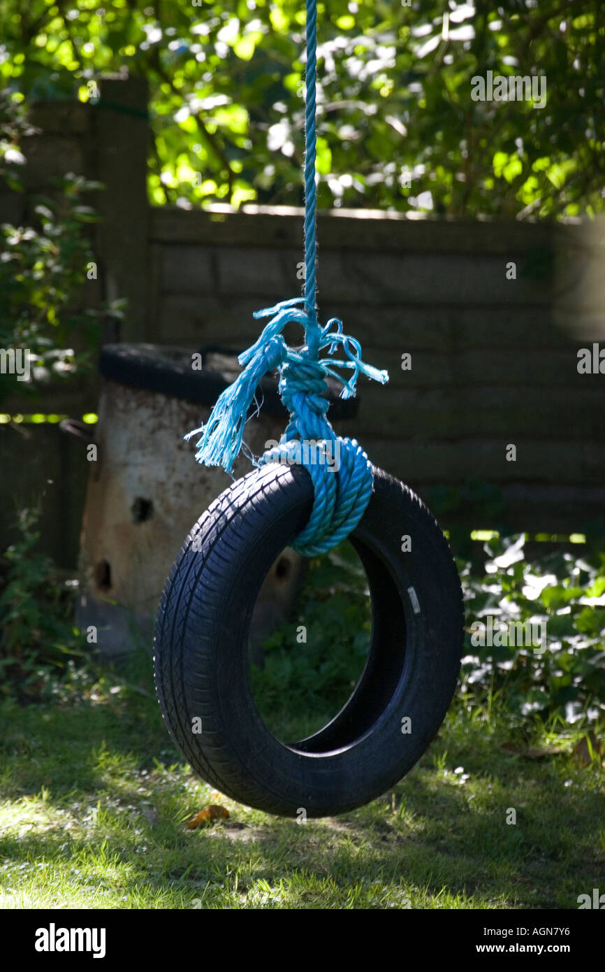 Childs tyre tree swing tire Stock Photo - Alamy