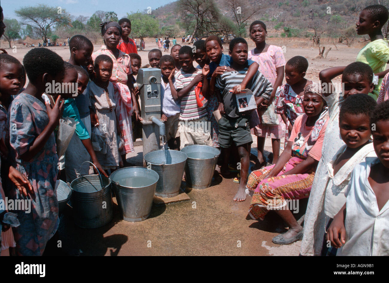 Children water africa buckets hi-res stock photography and images - Alamy