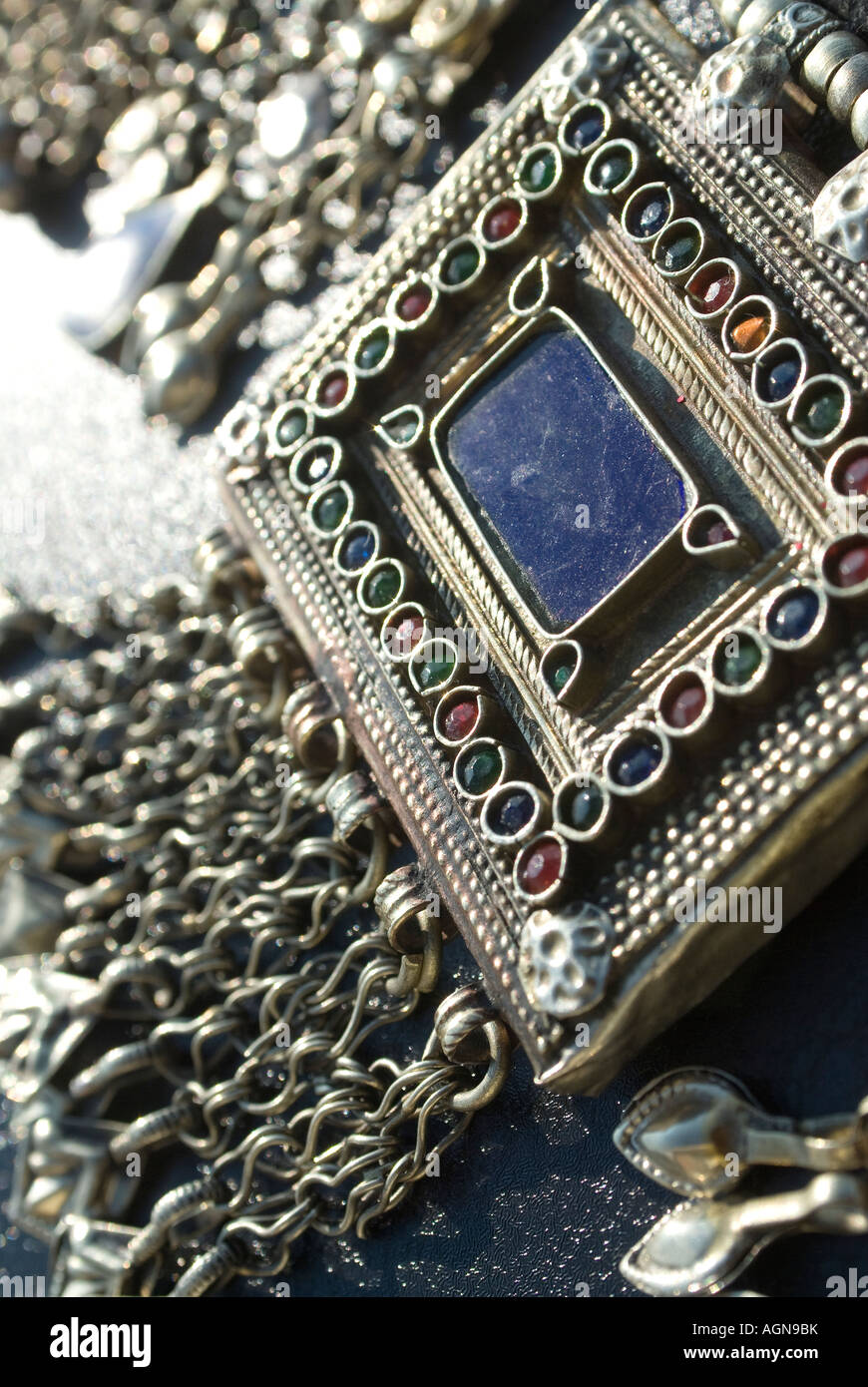 Hand made silver jewelry on a black background Stock Photo - Alamy