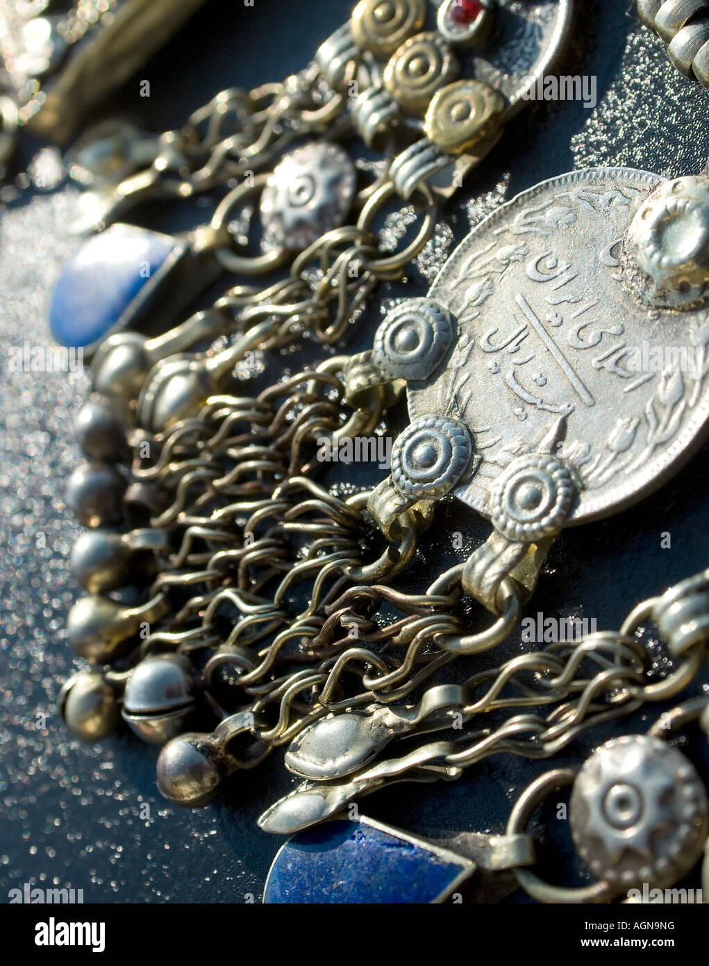 Hand made silver jewelry on a black background Stock Photo - Alamy