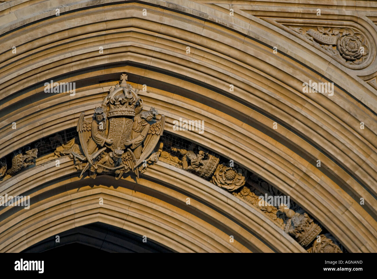 Ornate stone carving above the entrance to the Palace of Westminster at ...