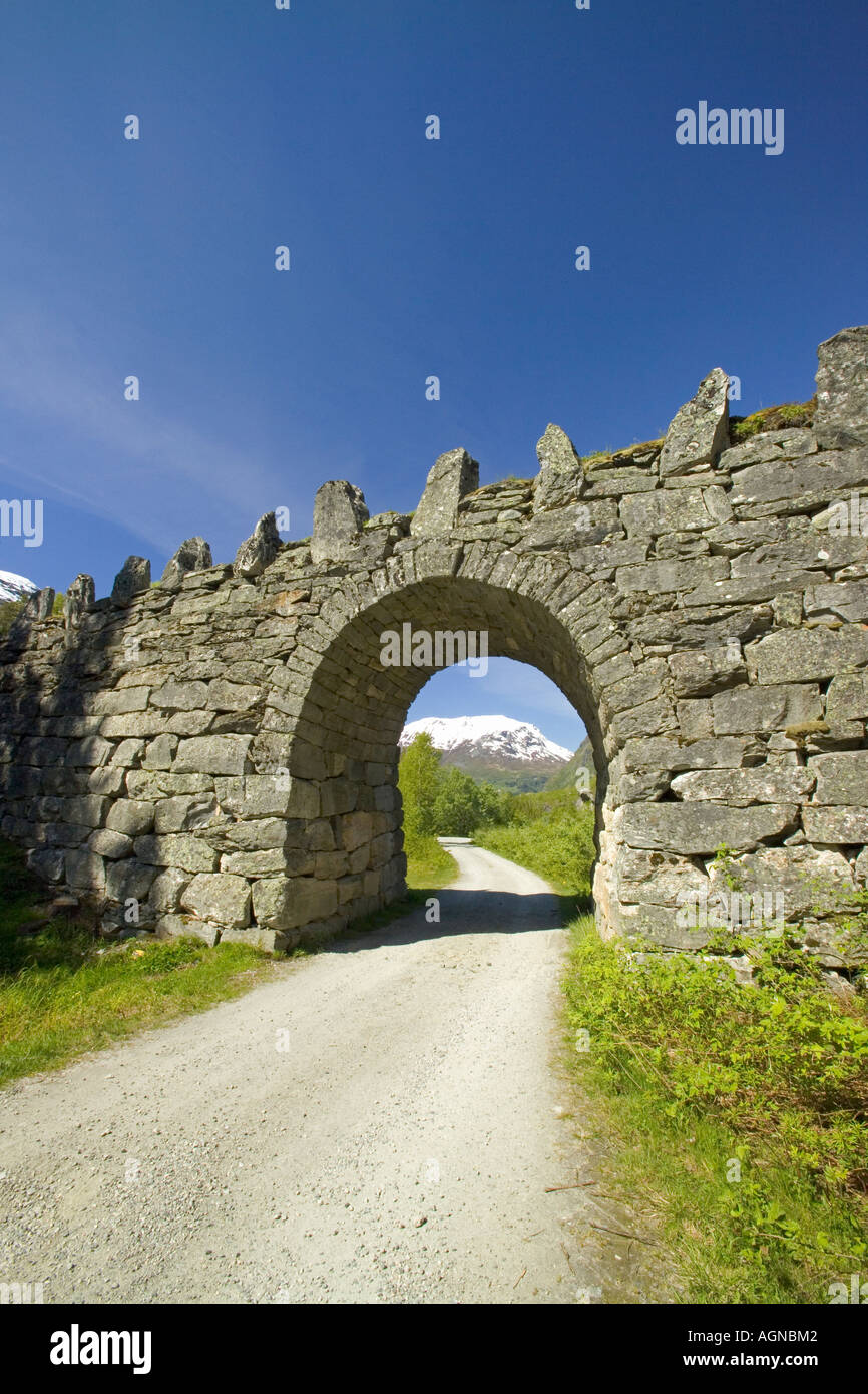 The old road to Geiranger with safety stones crossing under it self ...