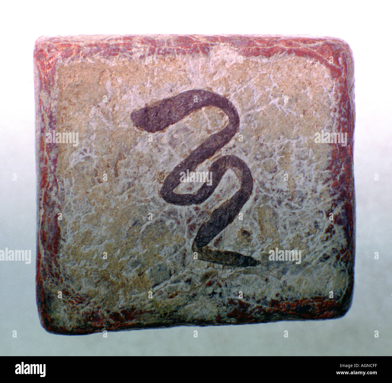 Roman lead cube with snake Stock Photo - Alamy