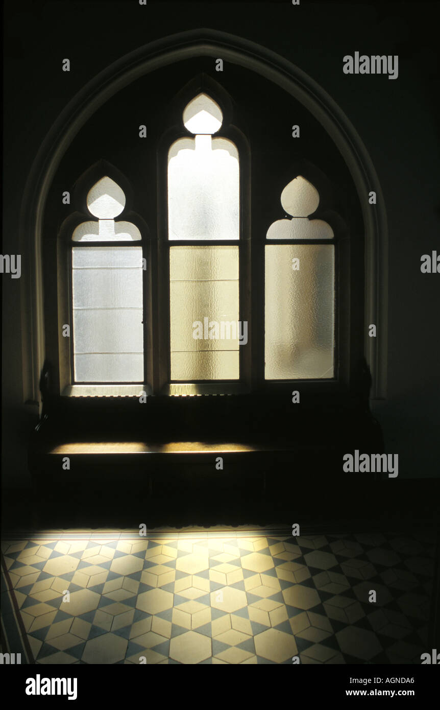 Interior of room with arched window Stock Photo - Alamy