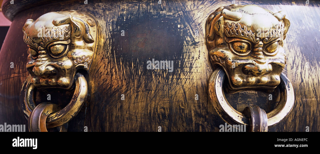 Fierce mythical beasts adorn giant brass vessel at ornate Forbidden ...