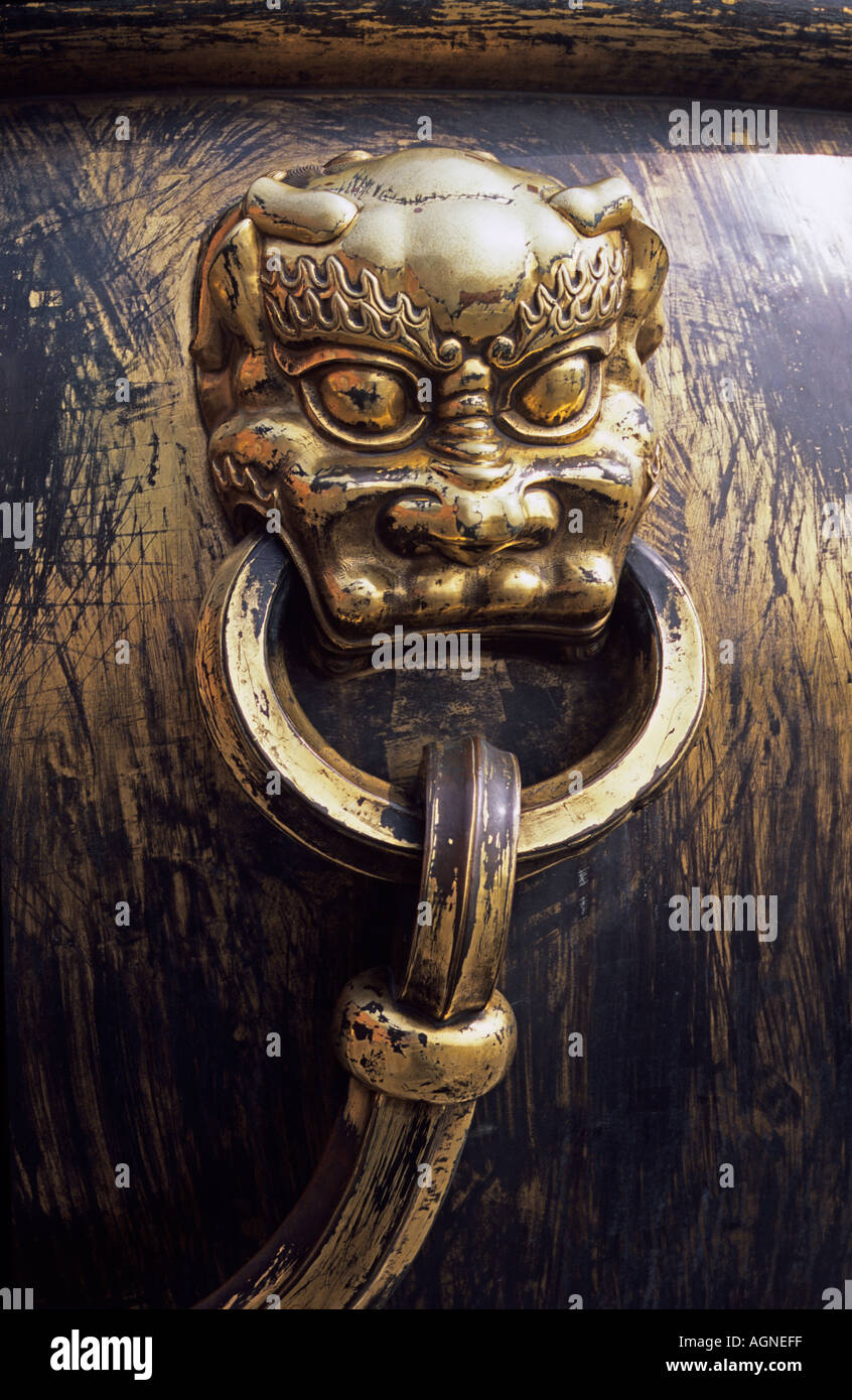 Fierce mythical beast adorns giant brass vessel at ornate Forbidden ...