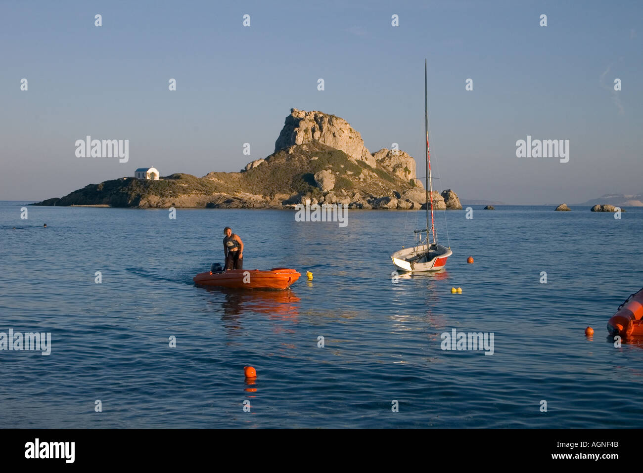 dh Kastri Island KASTRI ISLAND GREECE KOS Girl in motor boat Monastery ...