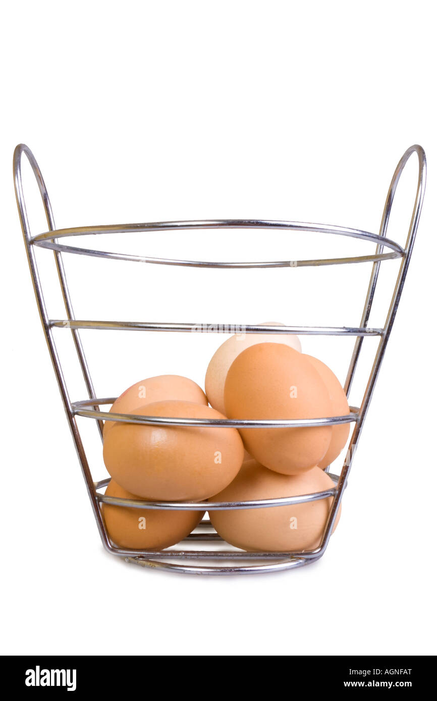 Wire egg container with eggs Stock Photo - Alamy