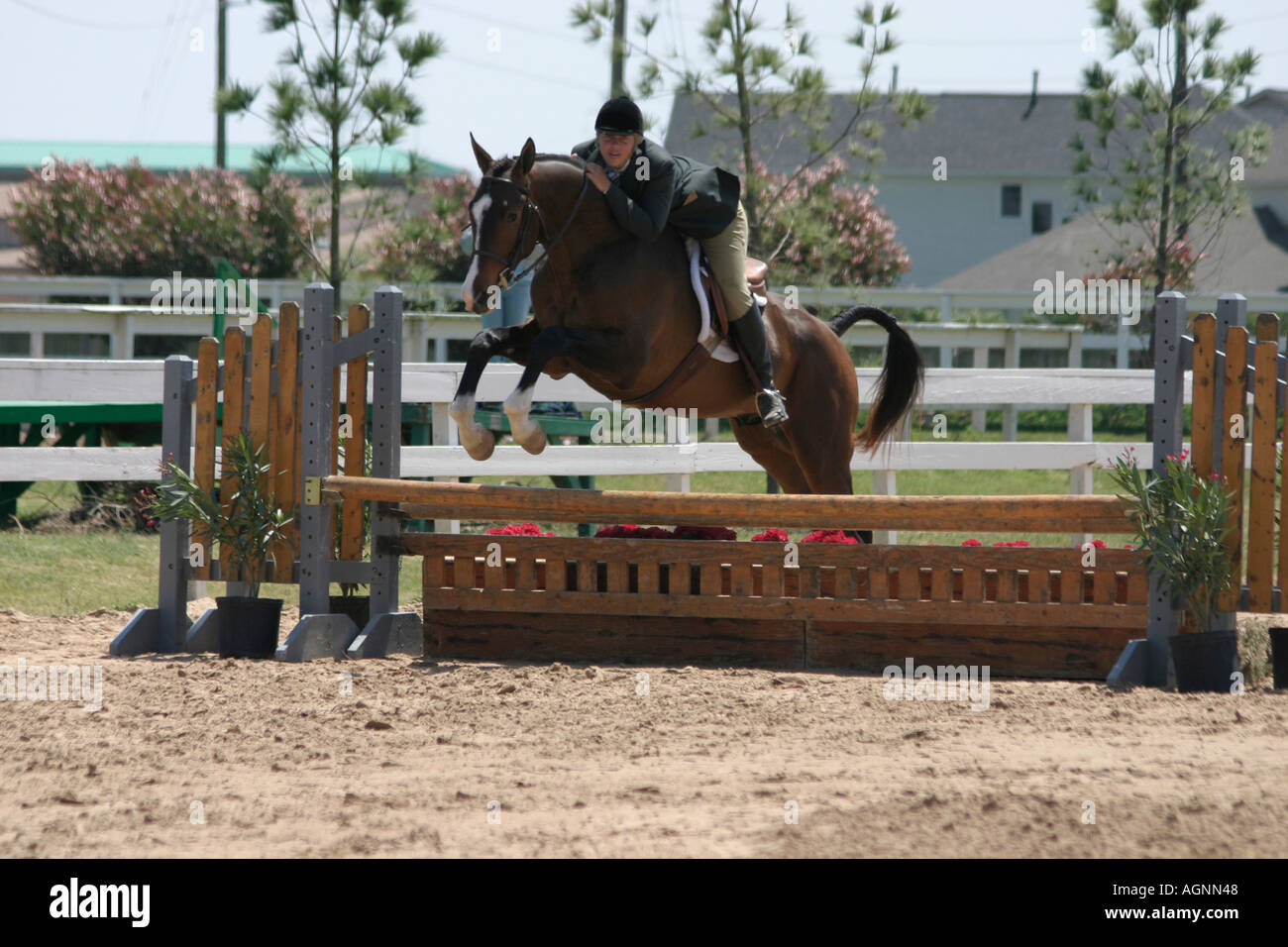 Over the jump Stock Photo - Alamy