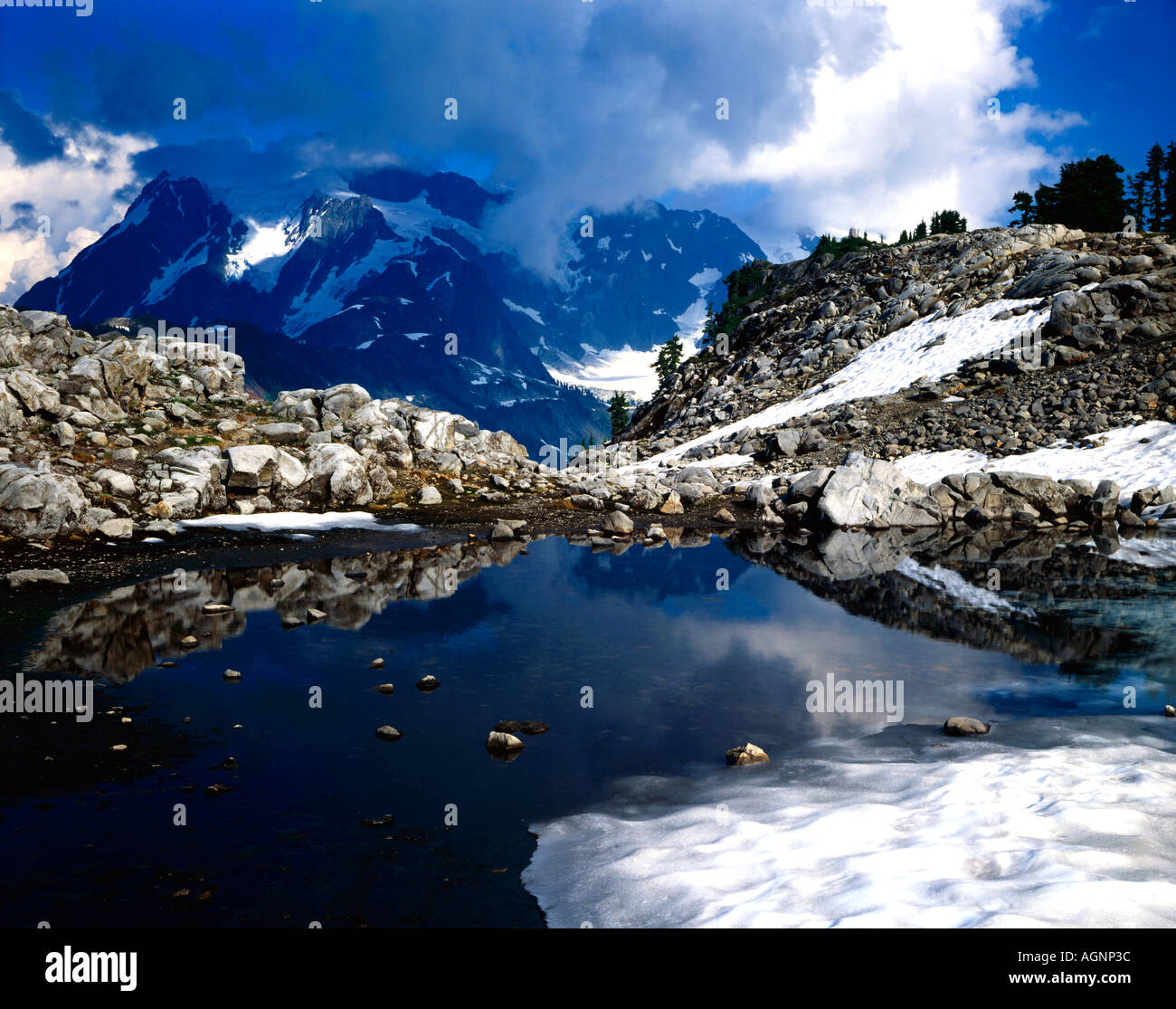 Alpine tarn in the high mountains near Mount Shuksan in Northern ...