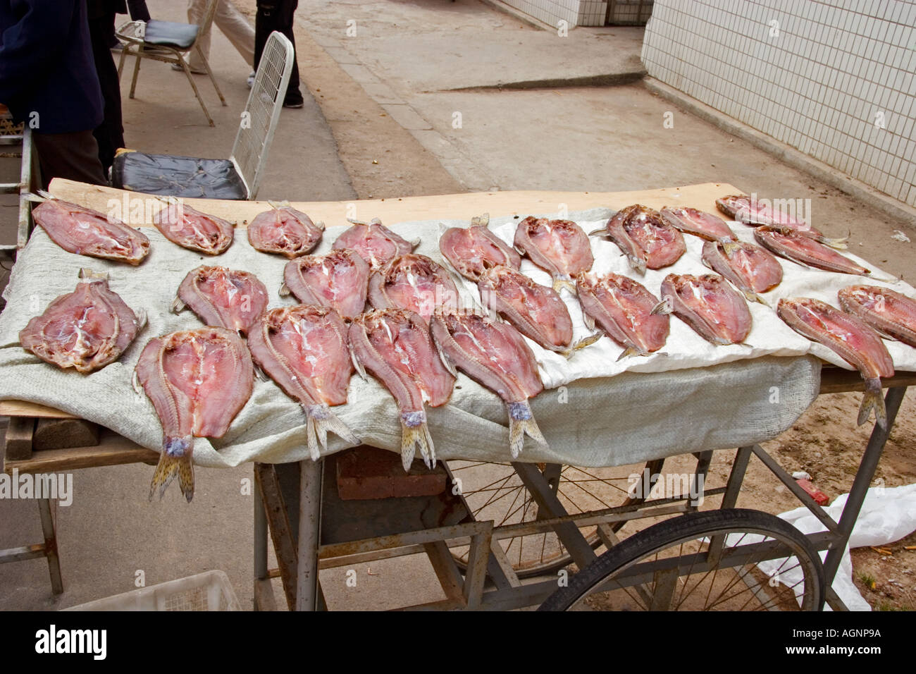 Fresh fish laid out to dry in a Chinese food market in Suzhou China ...