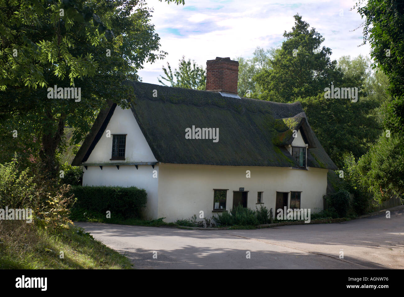 The thatched Bridge Cottage in Historic Flatford in Suffolk England ...