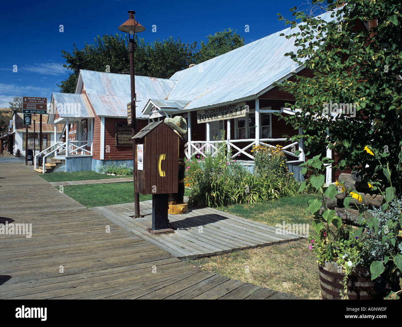 WINTHROP TOWN HALL with wooden facade and board walk in frontier town ...